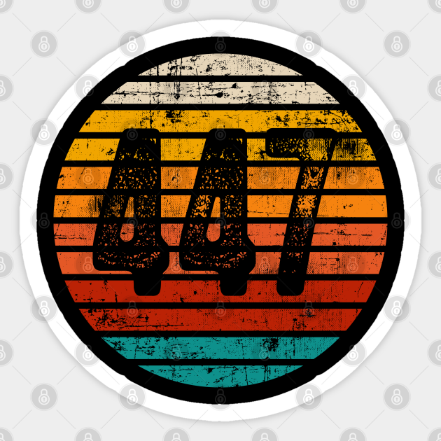 Distressed Vintage Sunset 447 Area Code 447 Area Code Sticker distressed-vintage-sunset-447-area-code-447-area-code-sticker